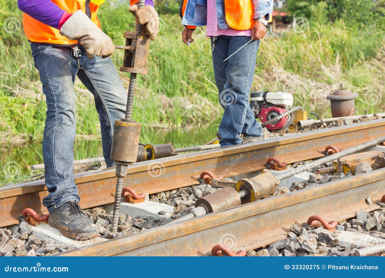 Workers Preparing Equipment for Maintenance of the Railway-Edit.tif ...