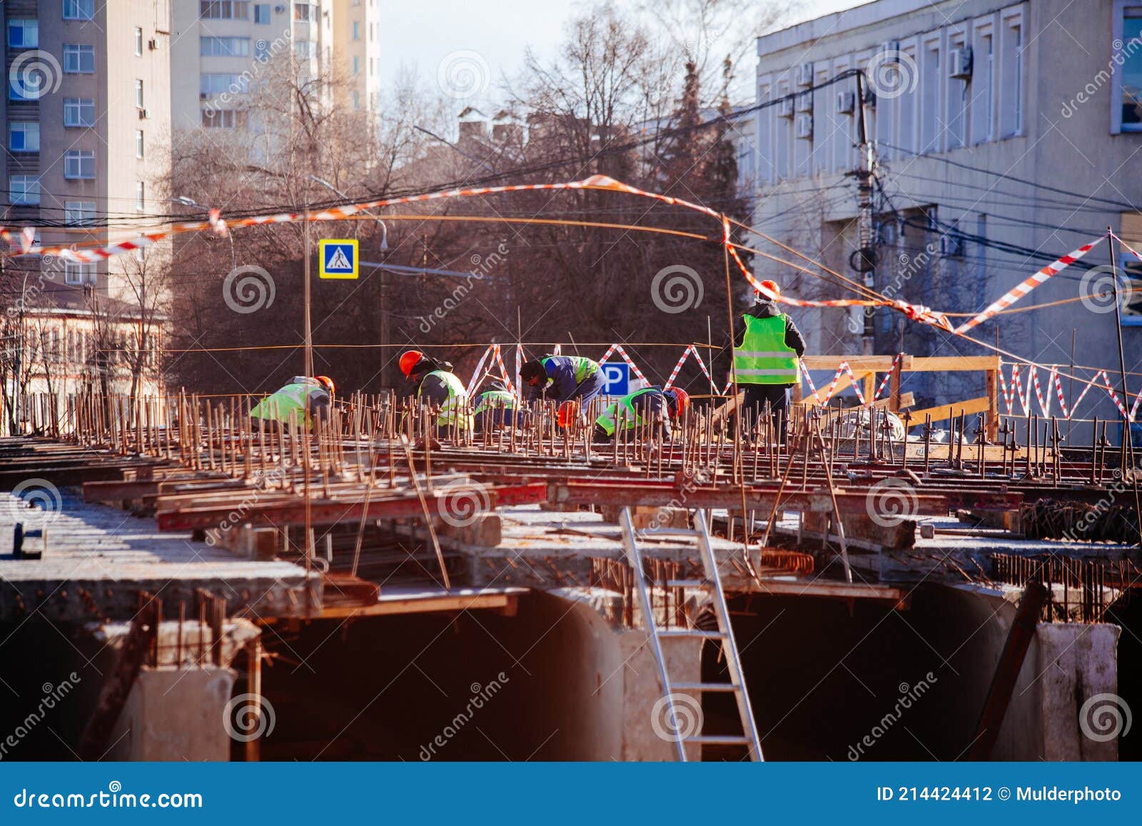 Workers In Protective Clothes Decontaminating Square Near ...