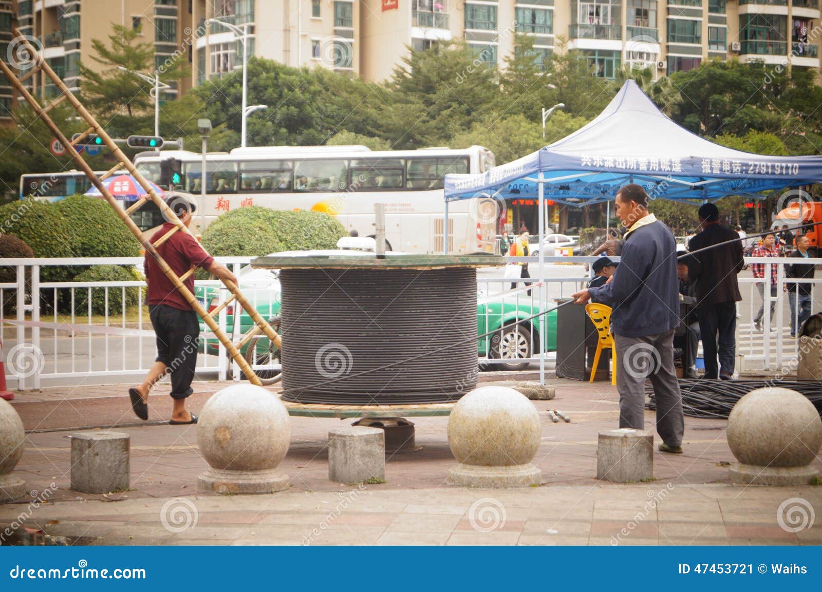 The Workers are Pulling the Cable Editorial Photo - Image of pavement ...