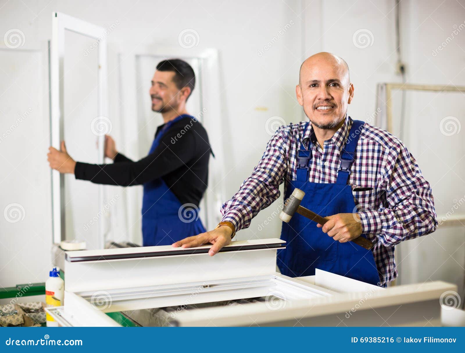 Workers with PVC Windows and Doors Stock Photo - Image of output ...