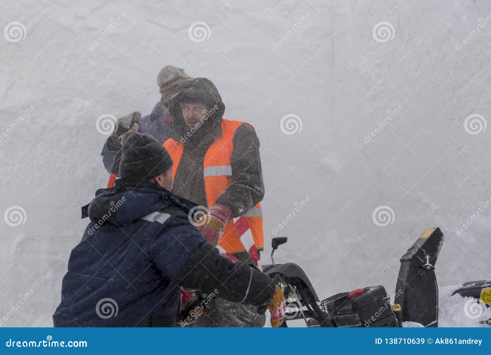 Three Workers in a Snowstorm during Snow Removal Stock Image - Image of ...