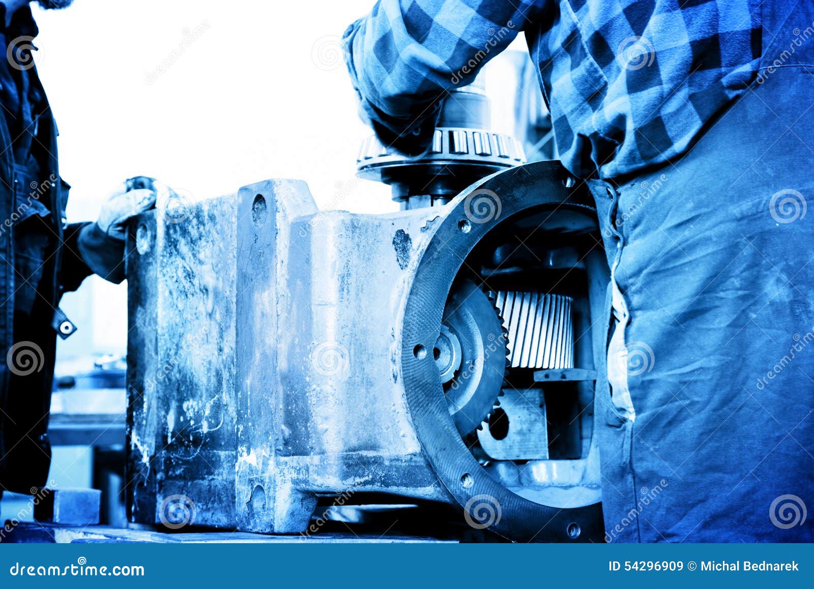 Workers Repair, Work on Old Gear Element in Workshop. Industry Stock ...