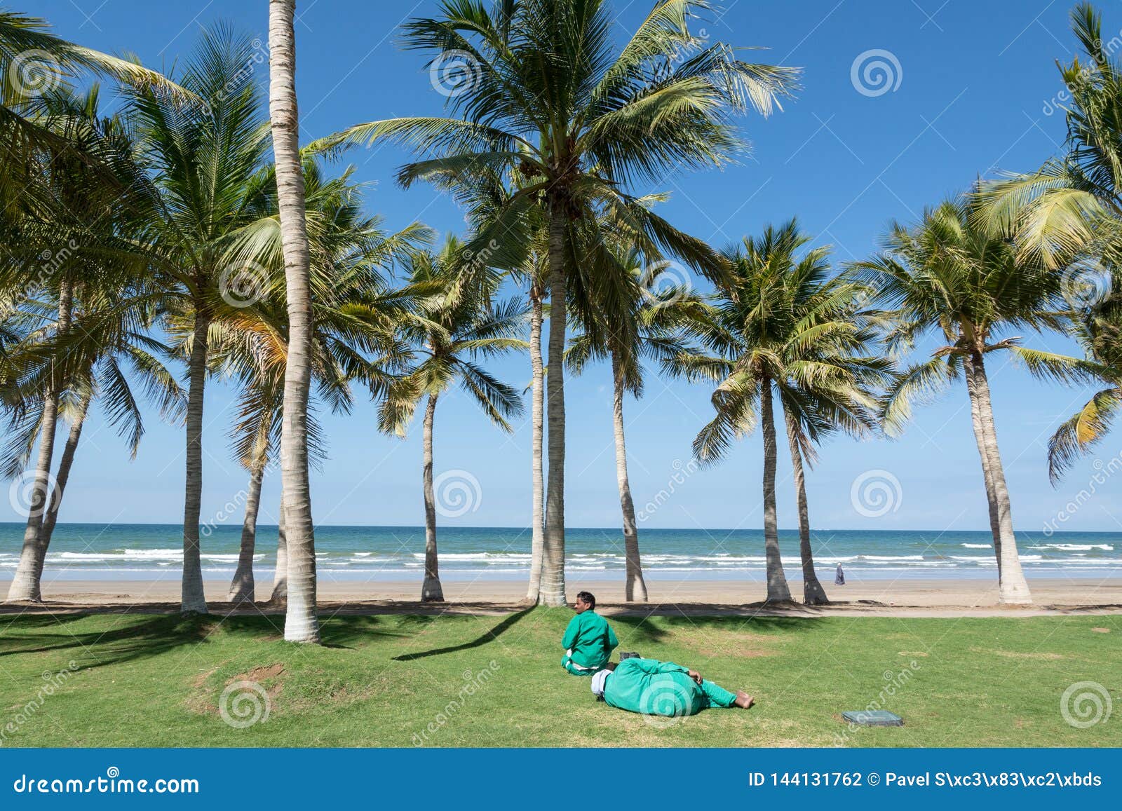 Workers Resting Under Palm Trees by the Sea Editorial Photography ...