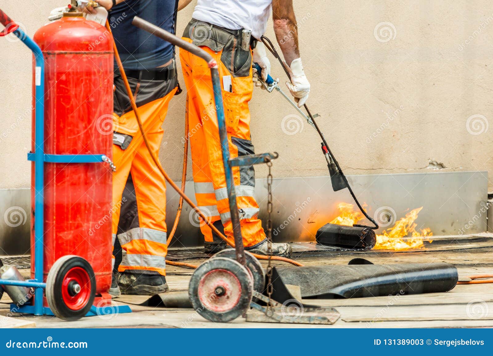 Workers on a Road or Roof Construction, Industry and Teamwork Work ...
