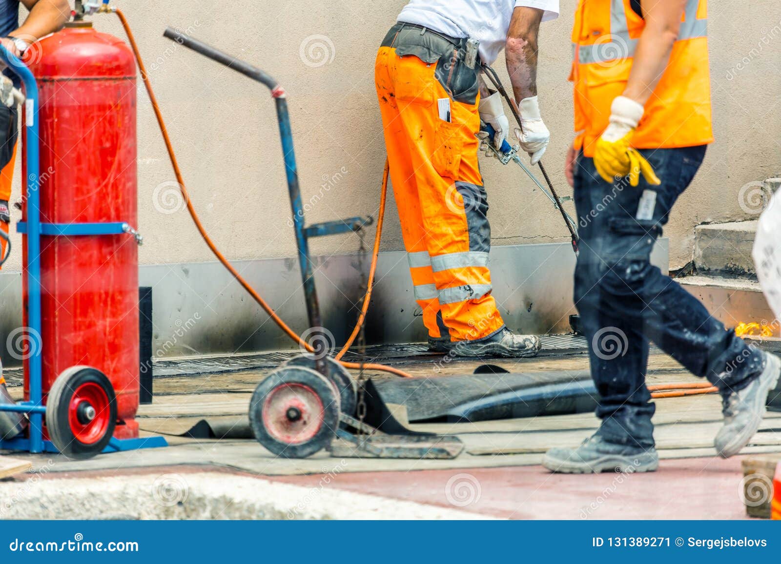 Workers On A Road Or Roof Construction, Industry And Teamwork Work ...