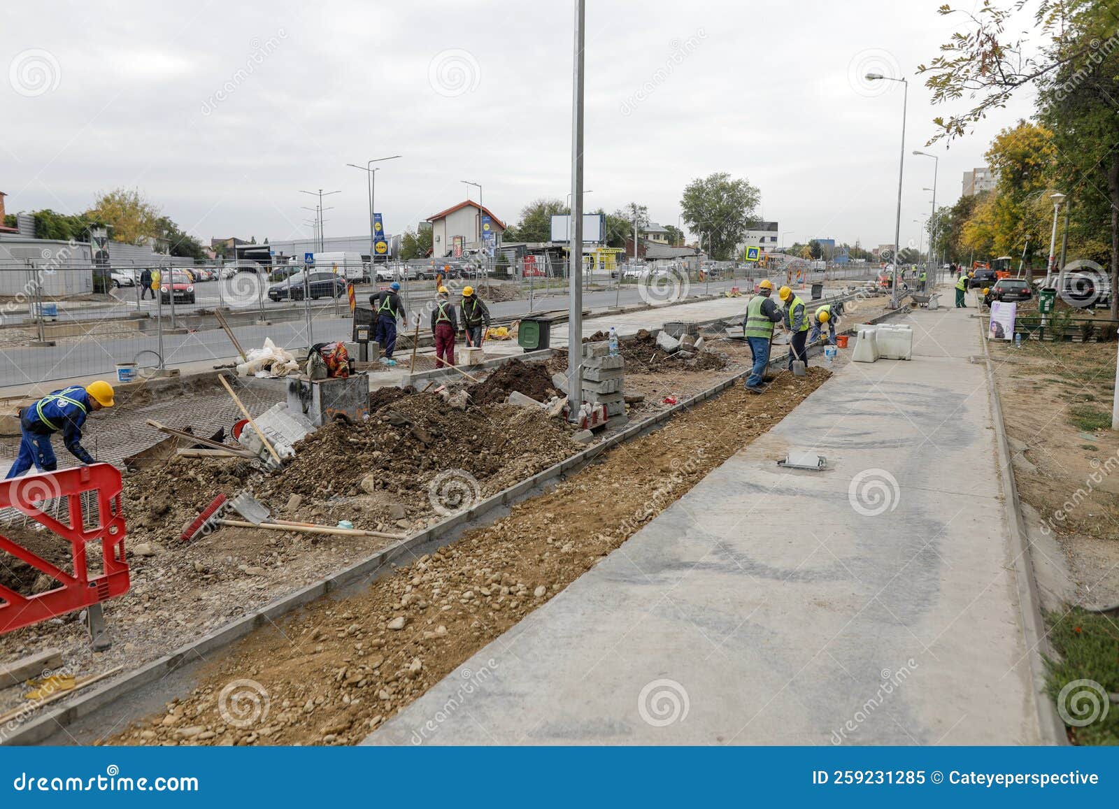 Workers at a Road Construction Site in the Prelungirea Ghencea Area in ...