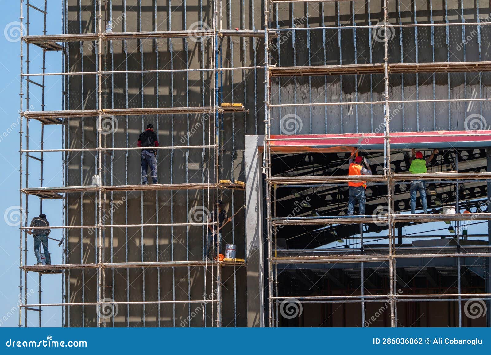 Workers on Scaffolding at a Construction Site Editorial Photography ...