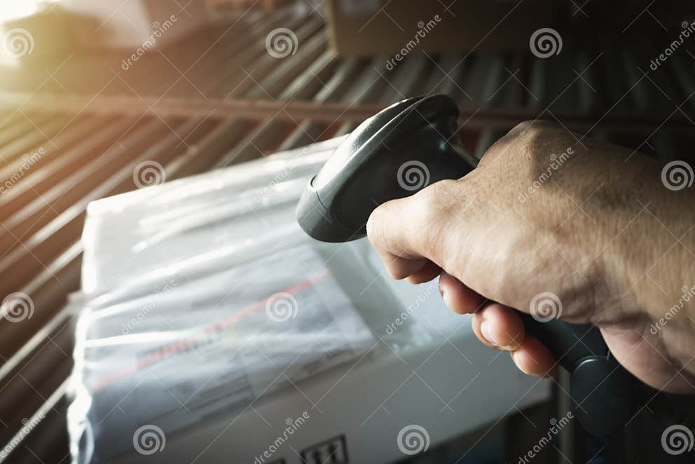 Workers Scanning Bar Code Scanner on Packaging Boxes. Shipping ...