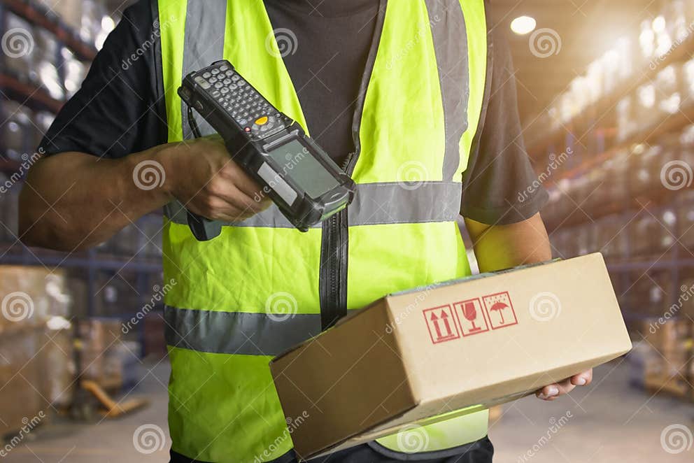 Workers Scanning Bar Code Scanner on Packaging Boxes. Shipping ...