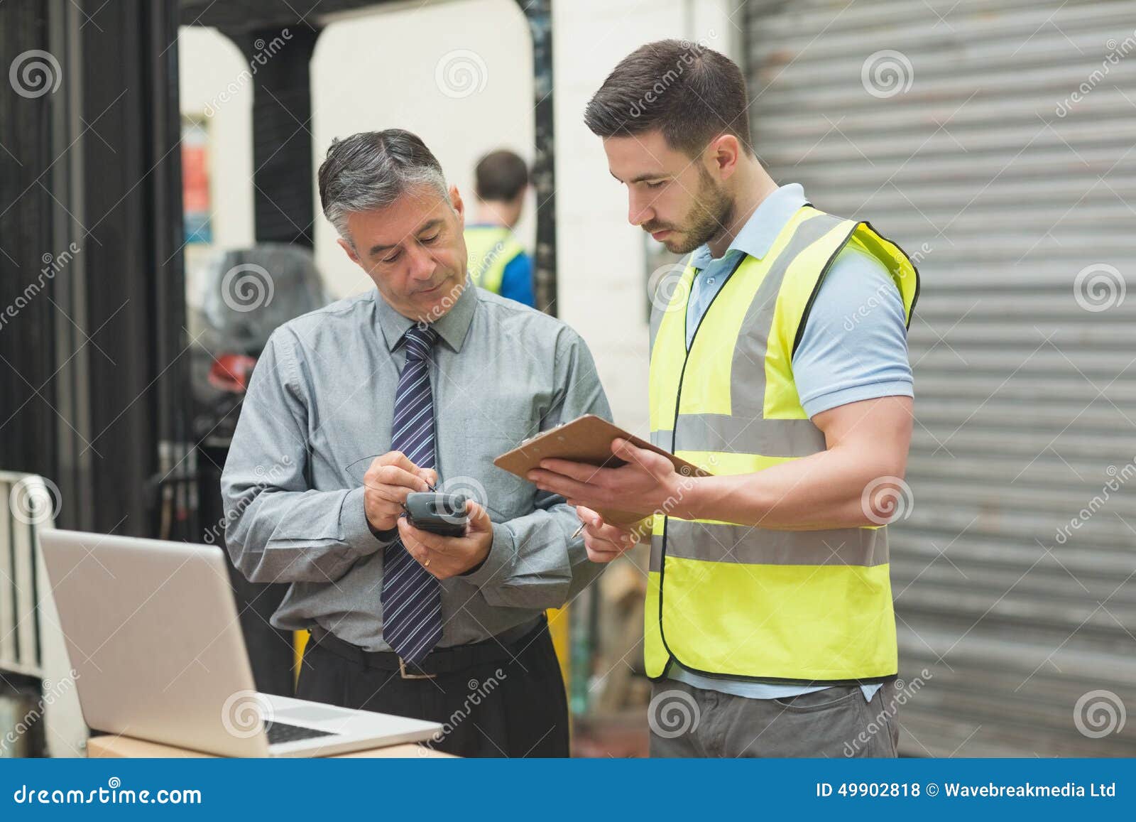 Workers Scanning Package in Warehouse Stock Photo - Image of mature ...