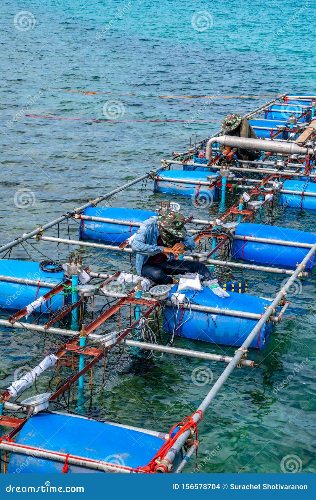 Workers Settle and Setup the Waterworks Fountain Machine on the Surface ...