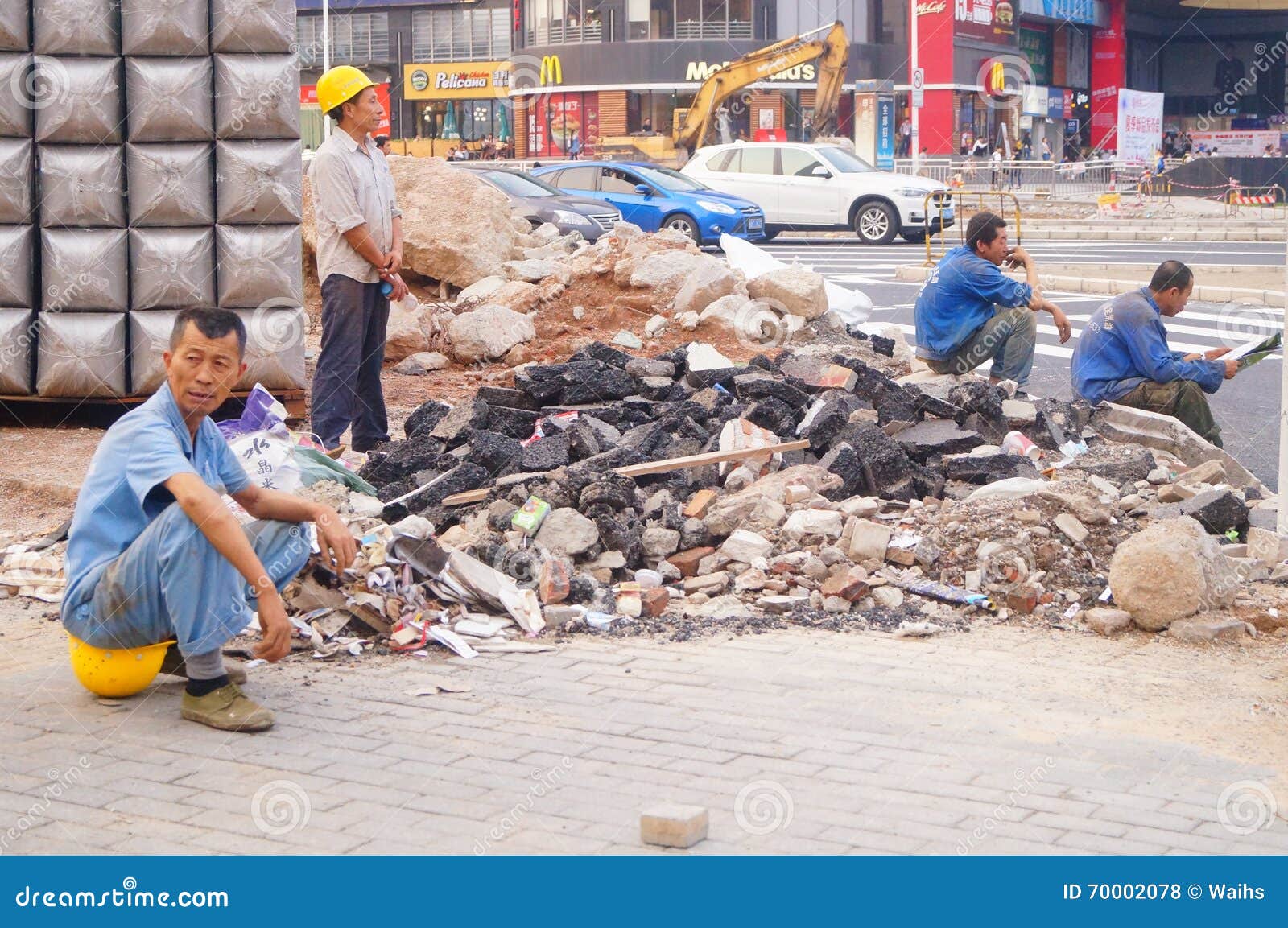Workers on the sidewalk. editorial stock photo. Image of ground - 70002078