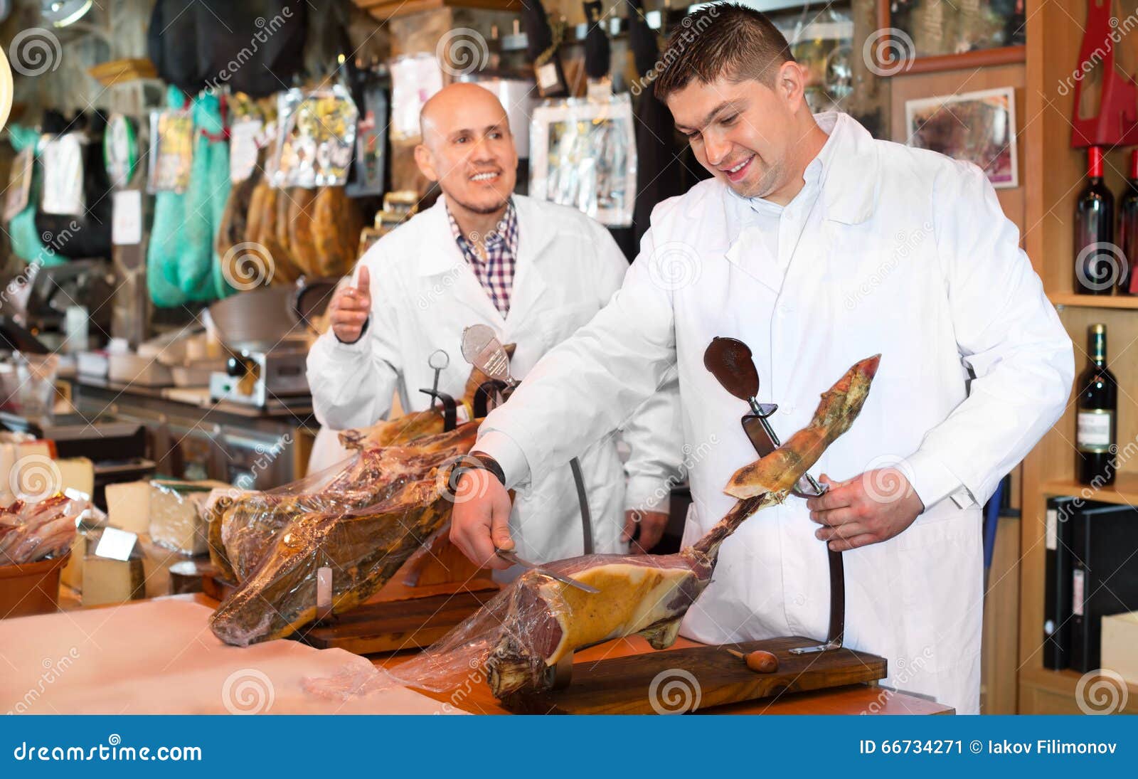 Workers slicing jamon stock image. Image of good, eating - 66734271