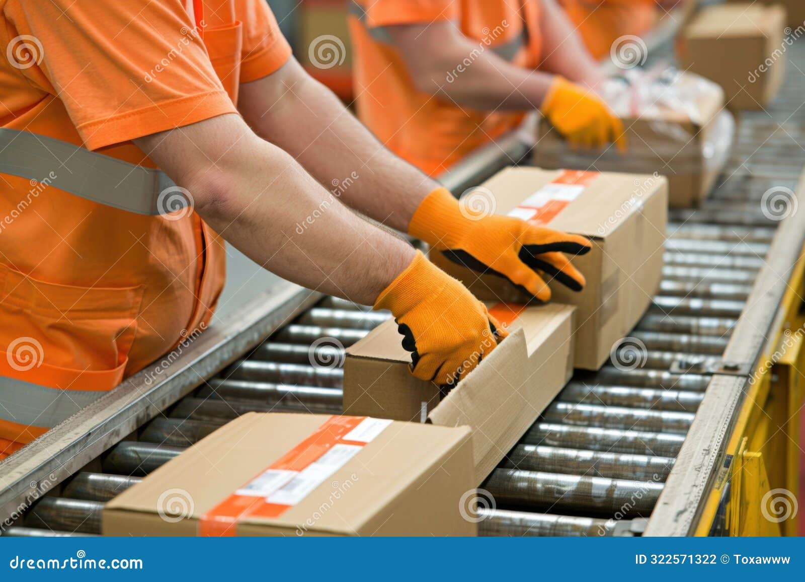 Workers Sorting Packages on Conveyor Belt in Warehouse Stock ...