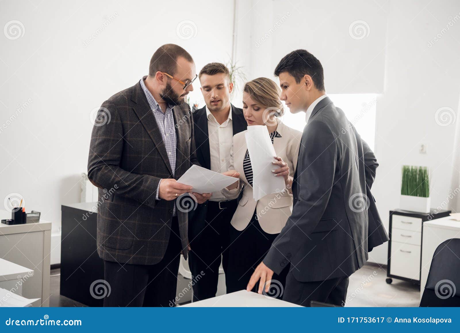 Workers Stand and Discuss the Documents with Their Chief Stock Image ...