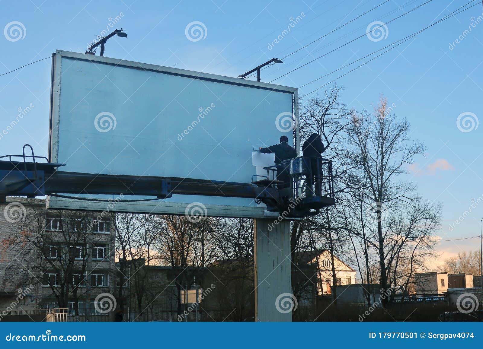 Workers Sticking a Poster on a Billboard Stock Image - Image of city ...