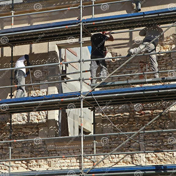 Workers on a Stone Wall Renovation Project Stock Image - Image of tool ...