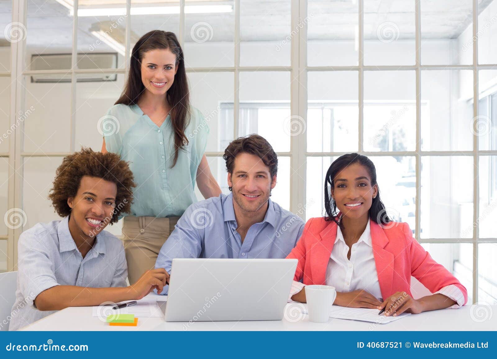 Workers at Table Smiling To Camera Stock Image - Image of three, four ...