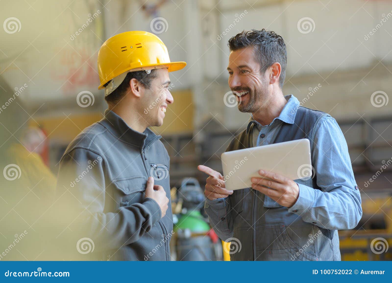 Workers Talking and Laughing at Factory Stock Photo - Image of person ...