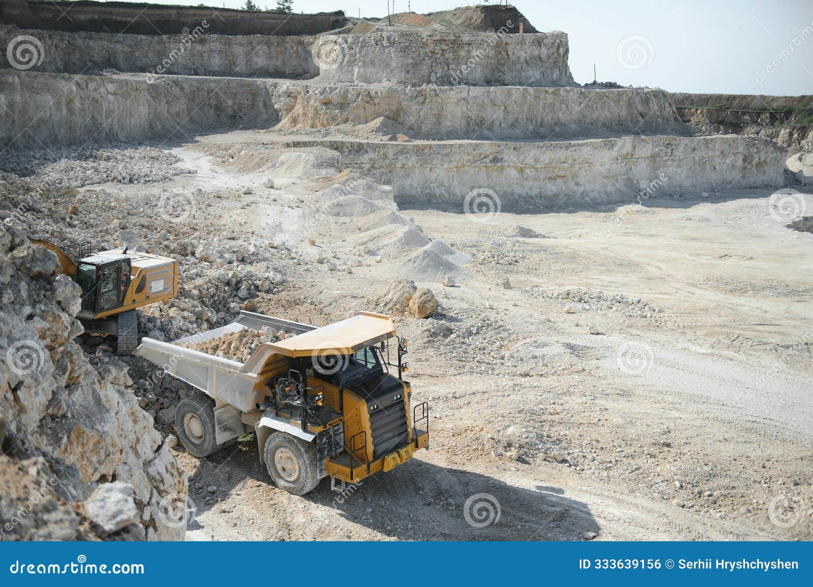 Workers Talking in Rock Quarry Stock Photo - Image of digger, machinery ...
