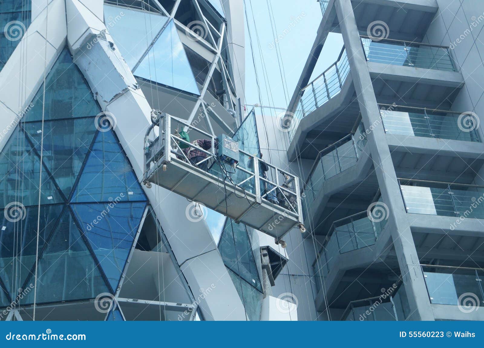 Workers in tall buildings editorial stock photo. Image of construction ...