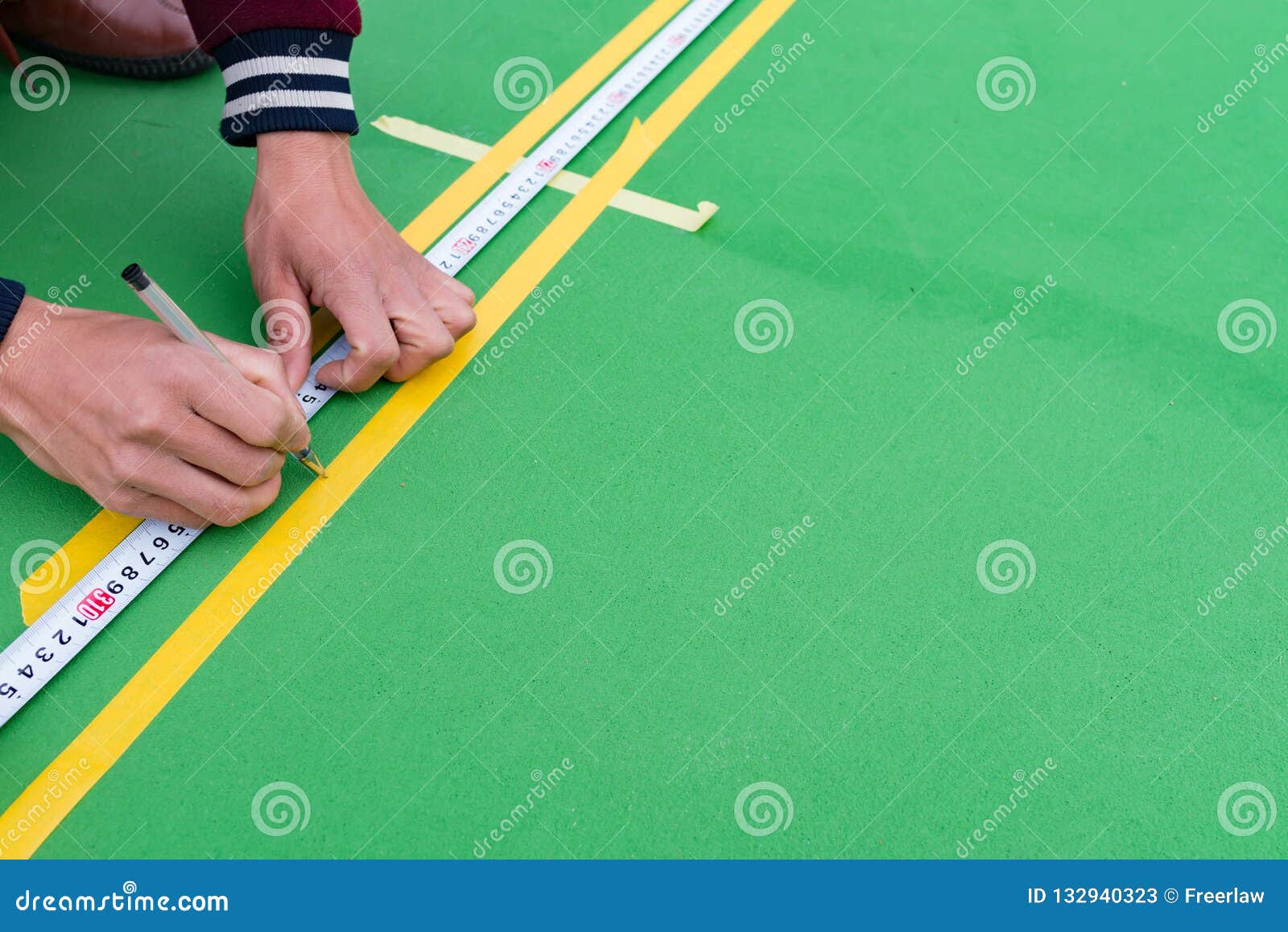 Workers Taping and Marking the Sideline on the Floor for Outdoor ...