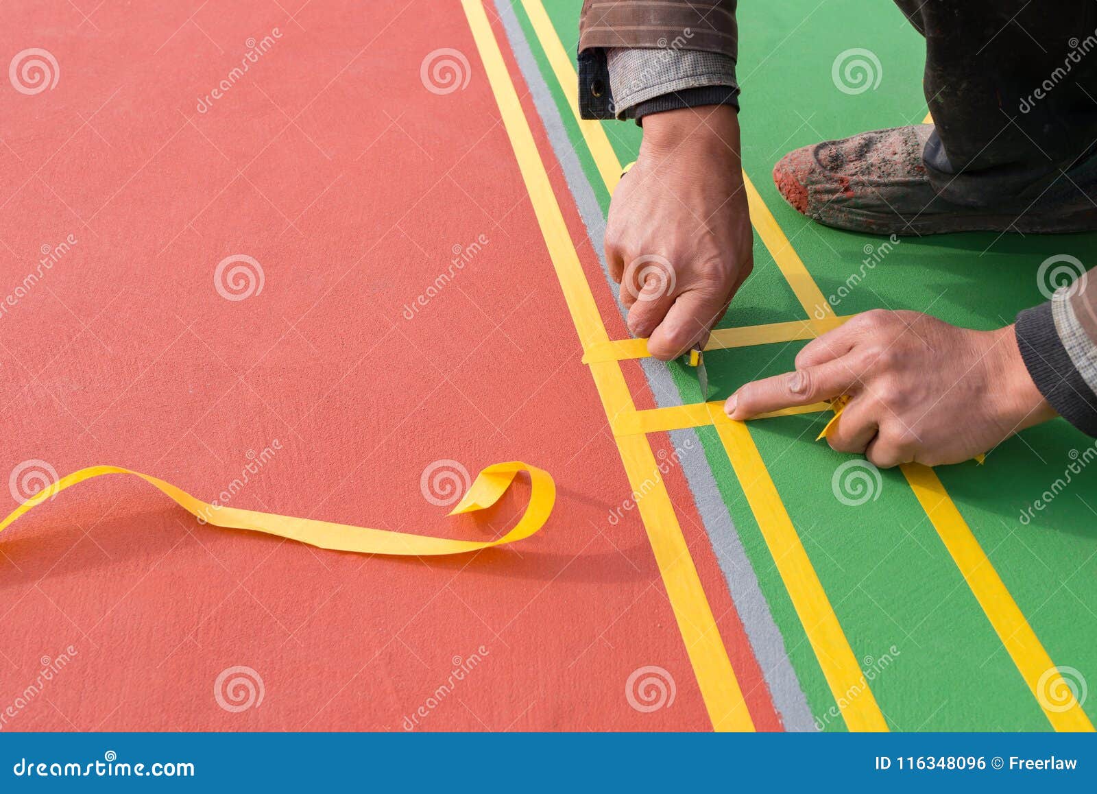 Workers Taping and Marking the Sideline on the Floor Stock Photo ...