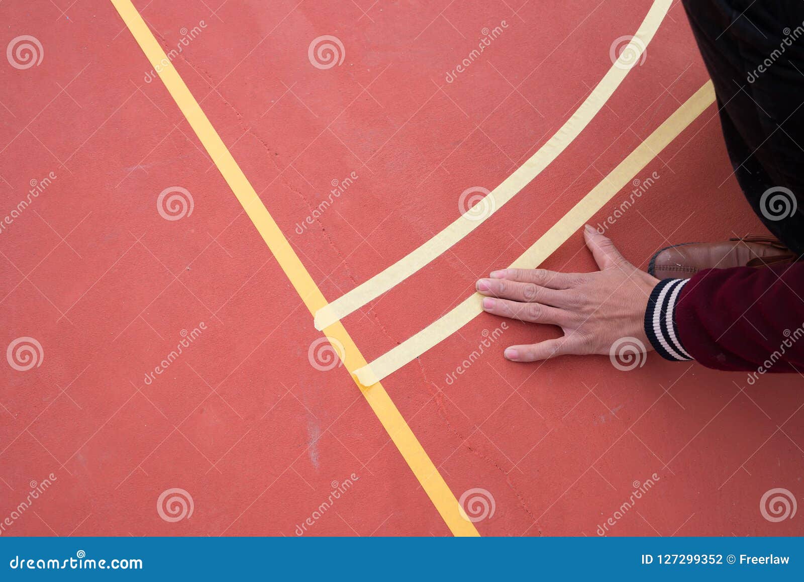 Workers Taping and Marking the Sideline on the Floor Stock Photo ...