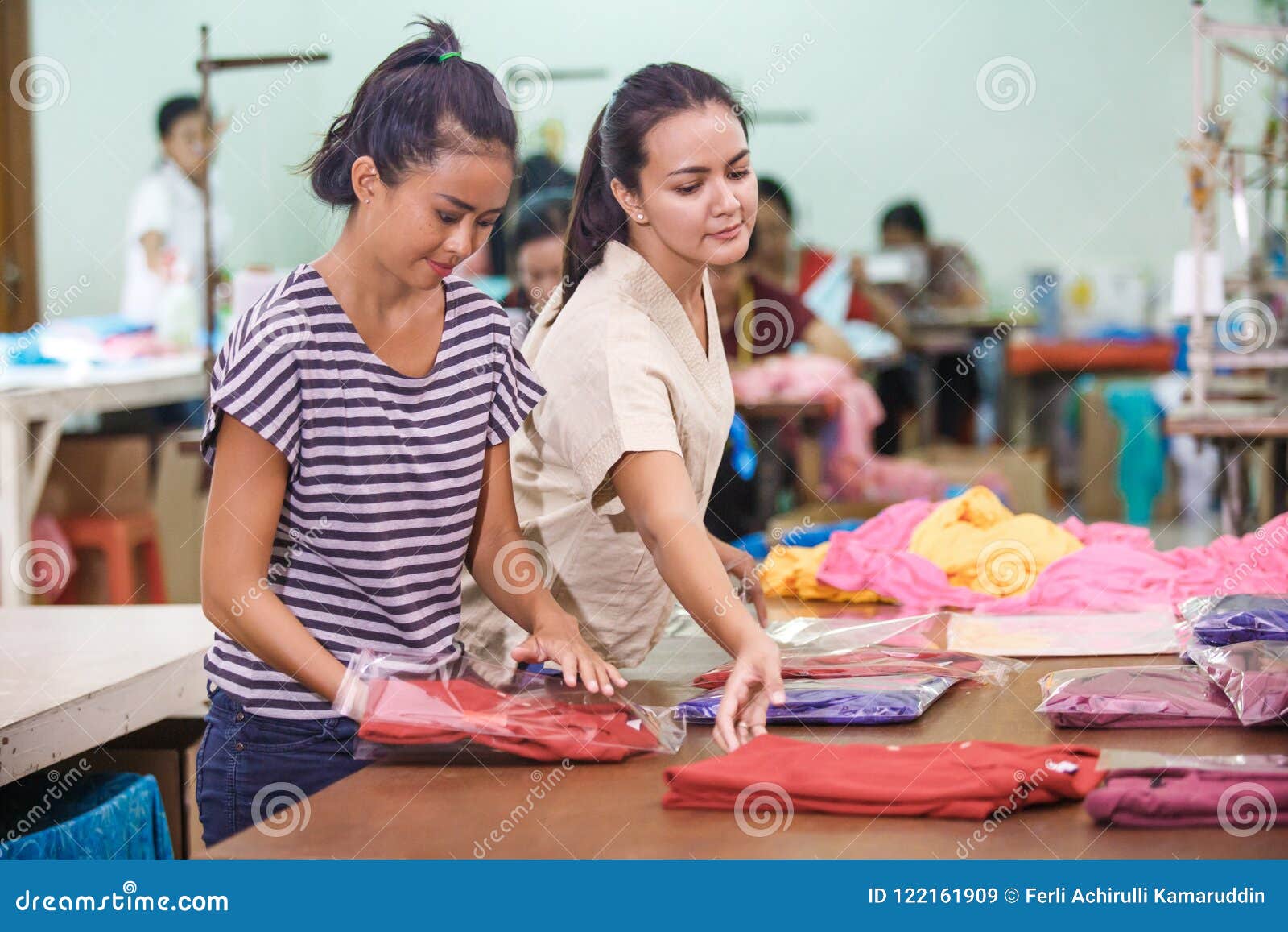 Workers at Textile Factory Packaging Their Products Stock Image - Image ...