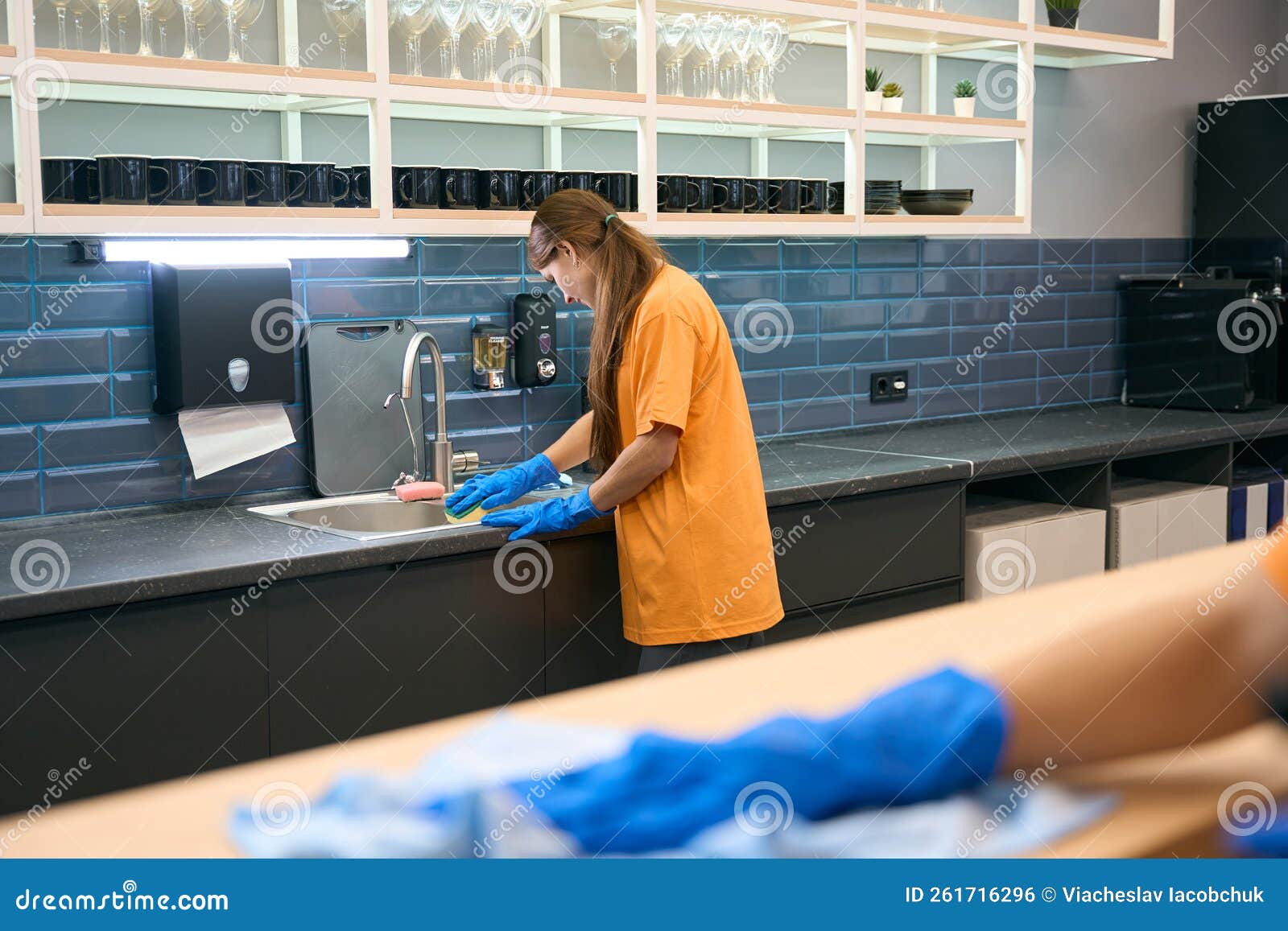 Workers in Uniform Clean and Disinfect Surfaces in Kitchen Area Stock ...