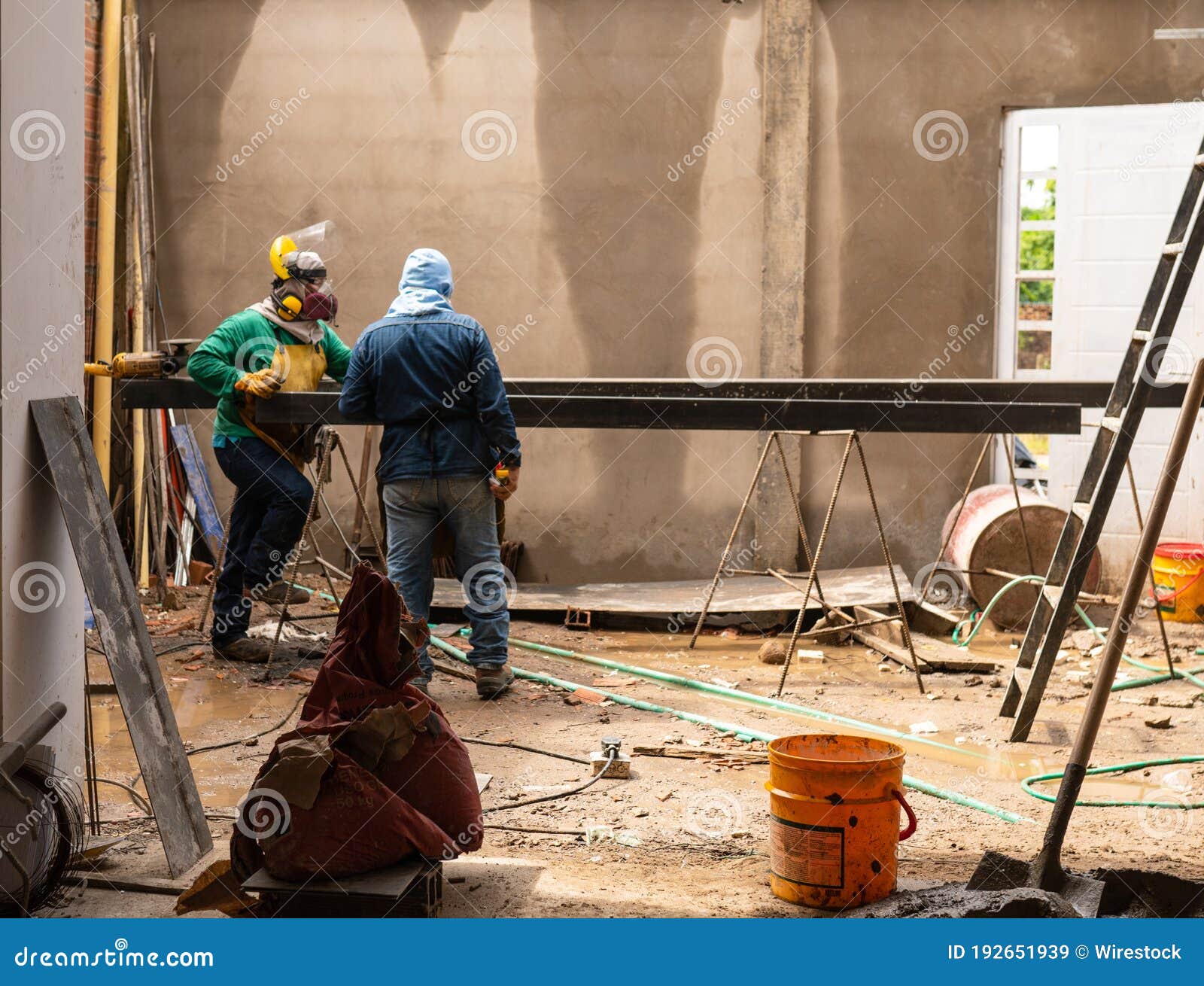 Workers with Uniforms Repairing the Stairs during the Construction of ...