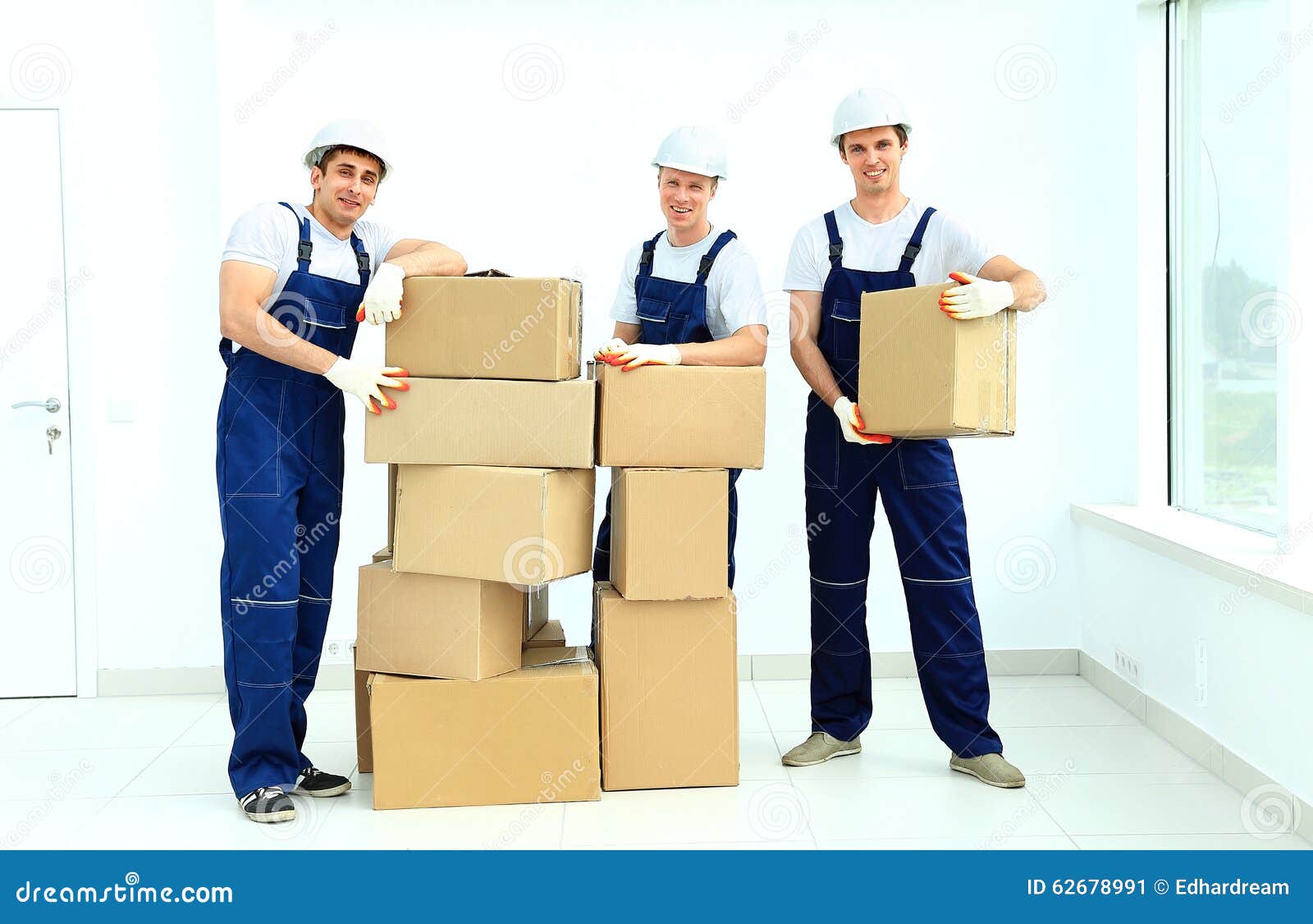 Workers unload boxes stock image. Image of male, construction - 62678991
