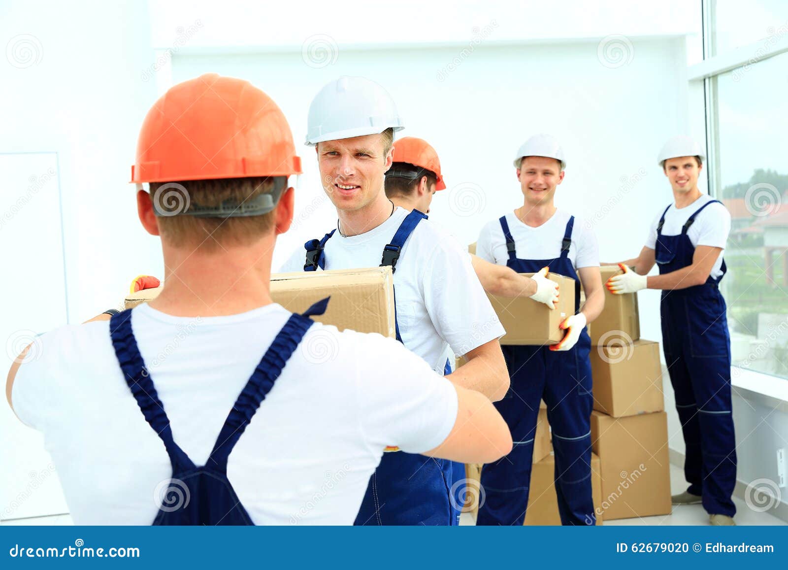 Workers unload boxes stock photo. Image of person, move - 62679020
