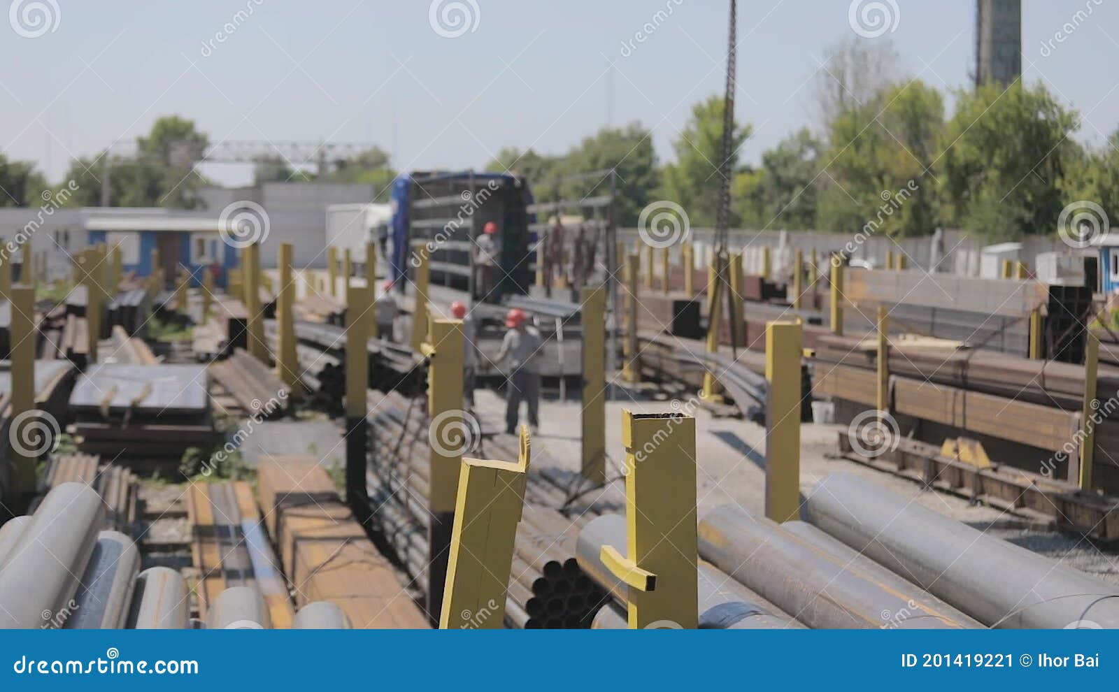 The Working Process in a Warehouse with a Metal. Workers Unload a Metal ...