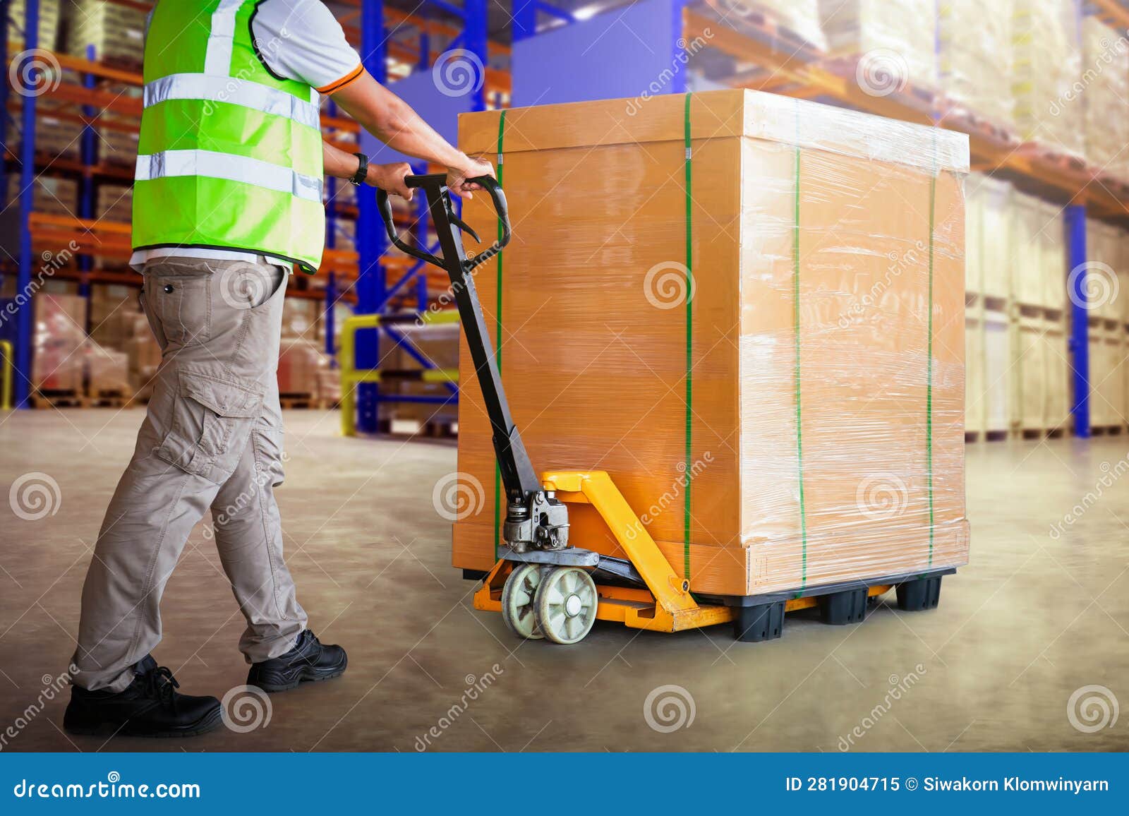 Workers Unloading Heavy Package Boxes in Storage Warehouse. Shipping ...