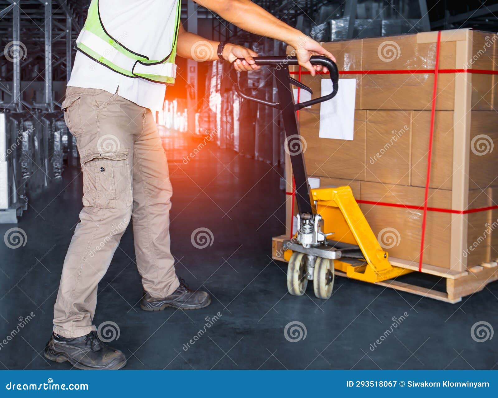 Workers Unloading Package Boxes on Pallet in Warehouse. Supply Chain ...