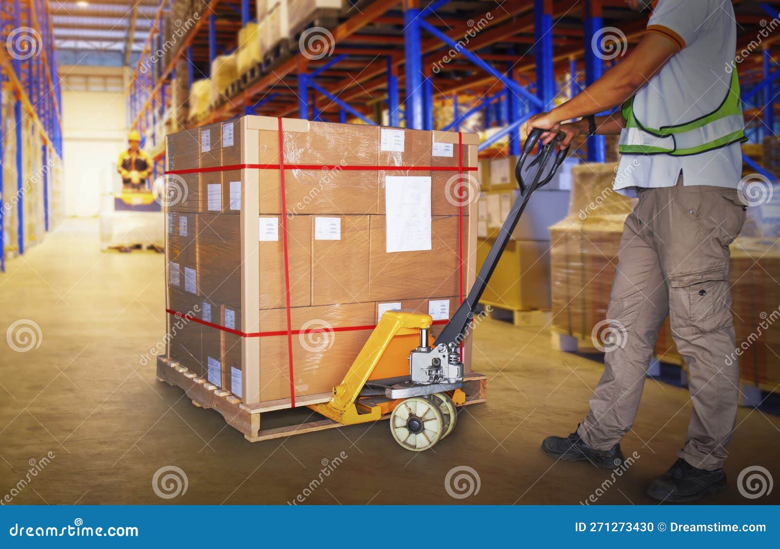 Workers Unloading Package Boxes on Pallets in Storage Warehouse ...