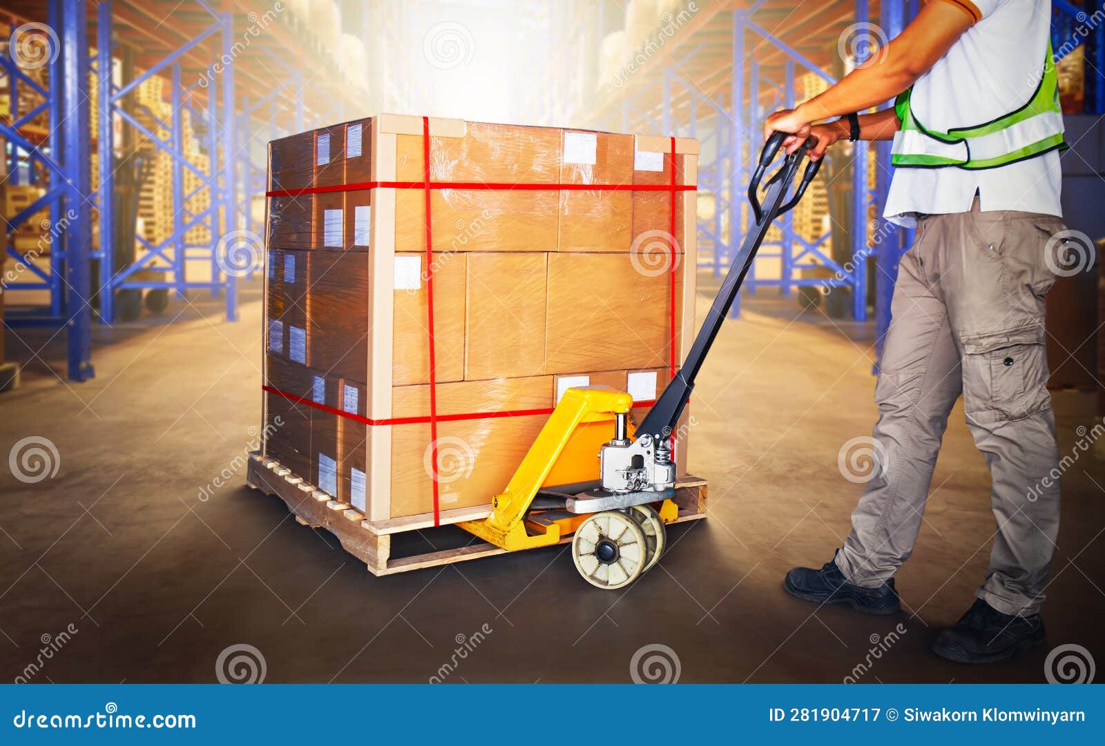 Workers Unloading Package Boxes on Pallets in Storage Warehouse ...