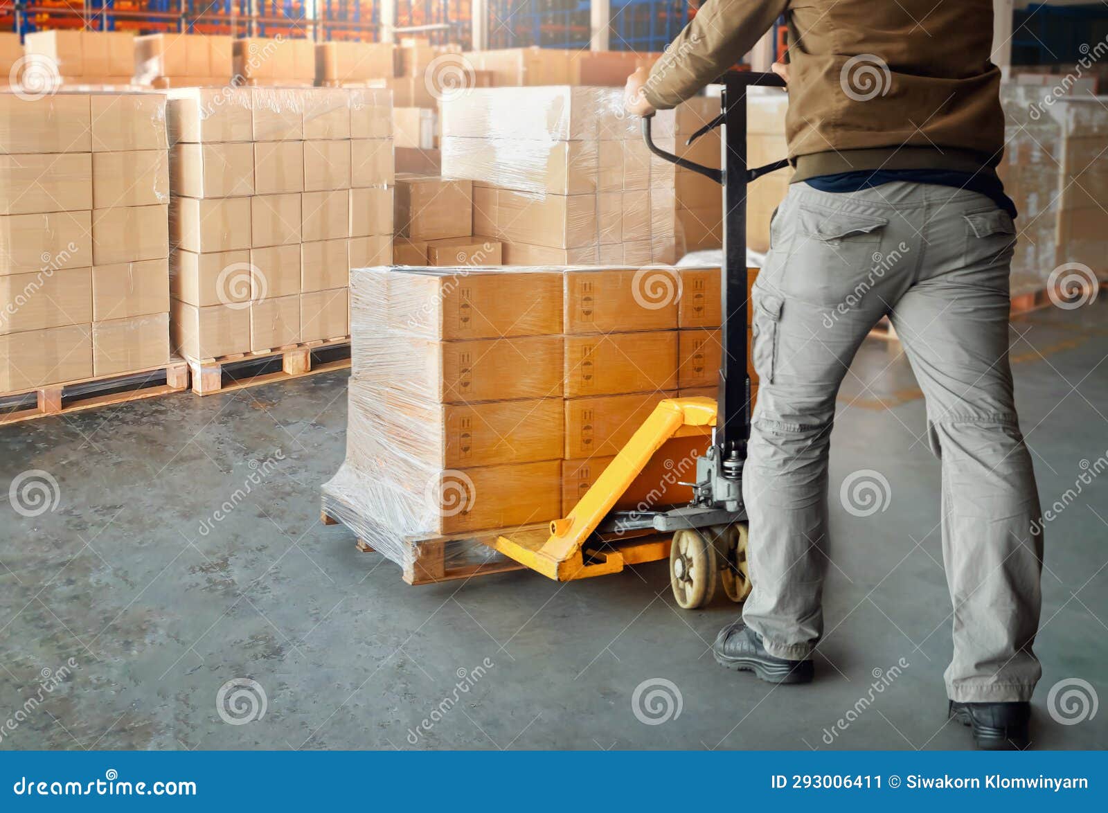 Workers Unloading Package Boxes Wrapped Plastic on Pallets in Storage ...