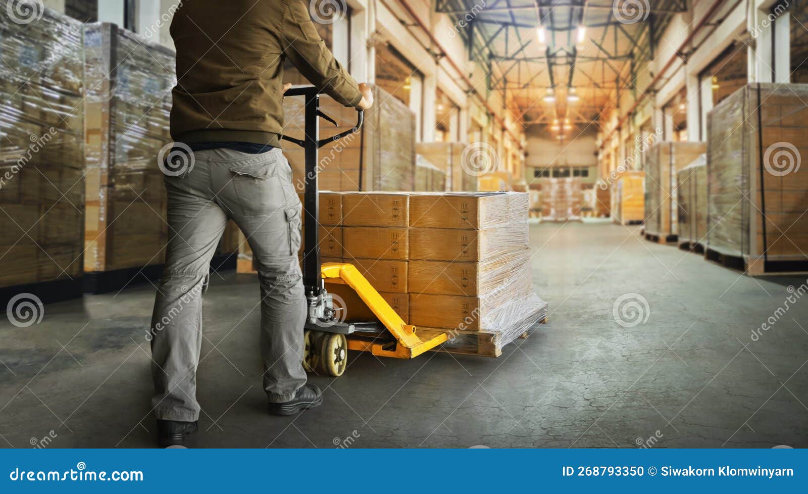 Workers Unloading Packaging Boxes on Pallets in Warehouse. Cartons ...