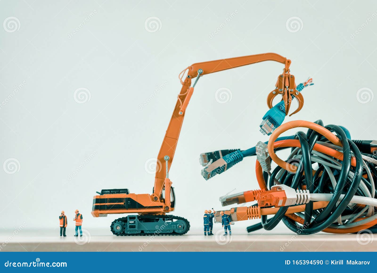 Workers Unraveling the Tangle of Network Cables Stock Photo - Image of ...