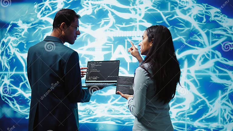 Workers Using Artificial Intelligence Deep Learning To Look at Data Stock Photo - Image of ...