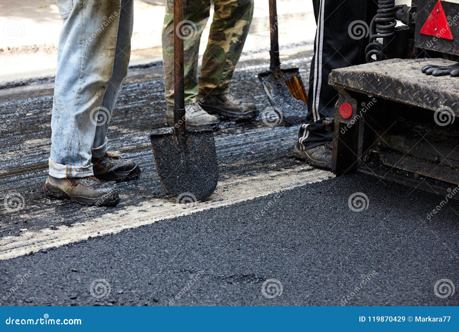 Workers Using Asphalt Paver Tools during Road Construction. Stock Image ...
