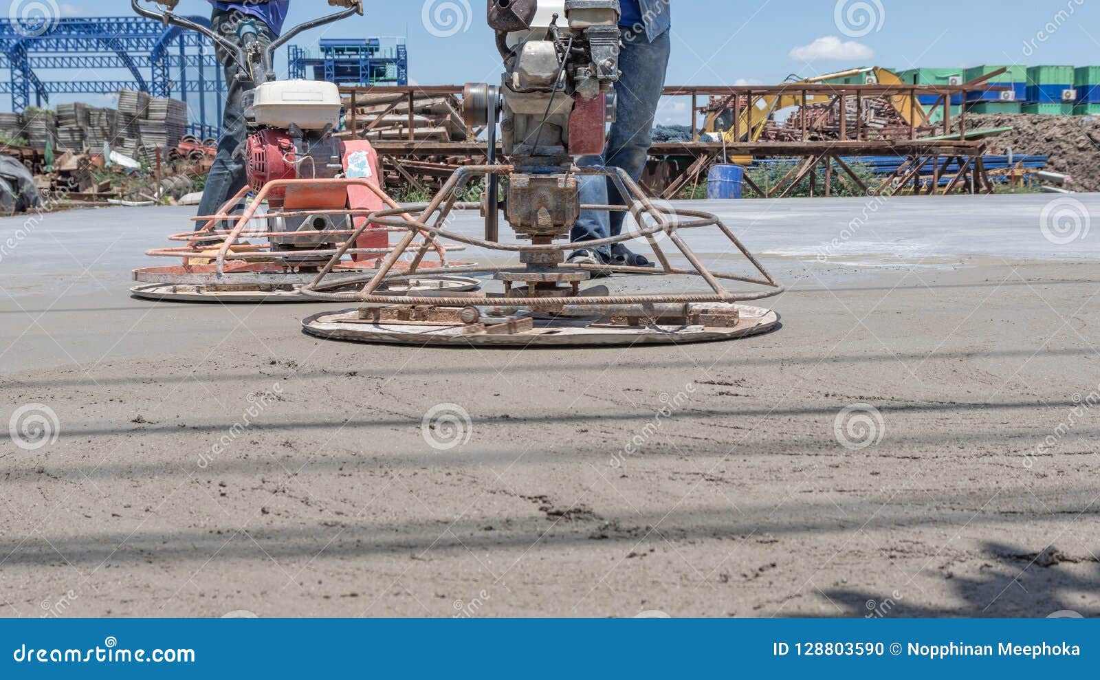 Workers are Using Concrete Polishing Machines for Cement after Pouring ...