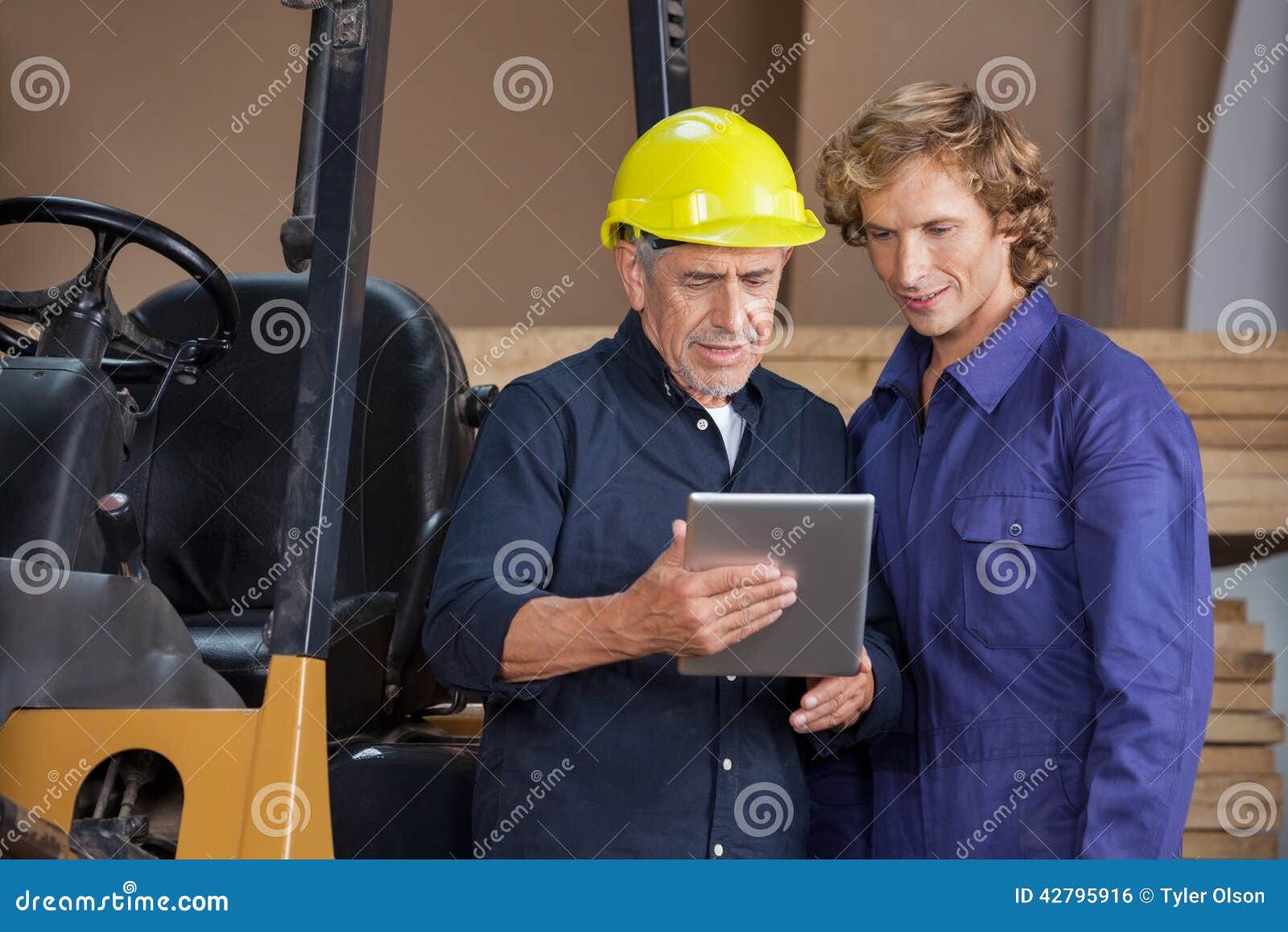 Workers Using Digital Tablet in Workshop Stock Photo - Image of manual ...