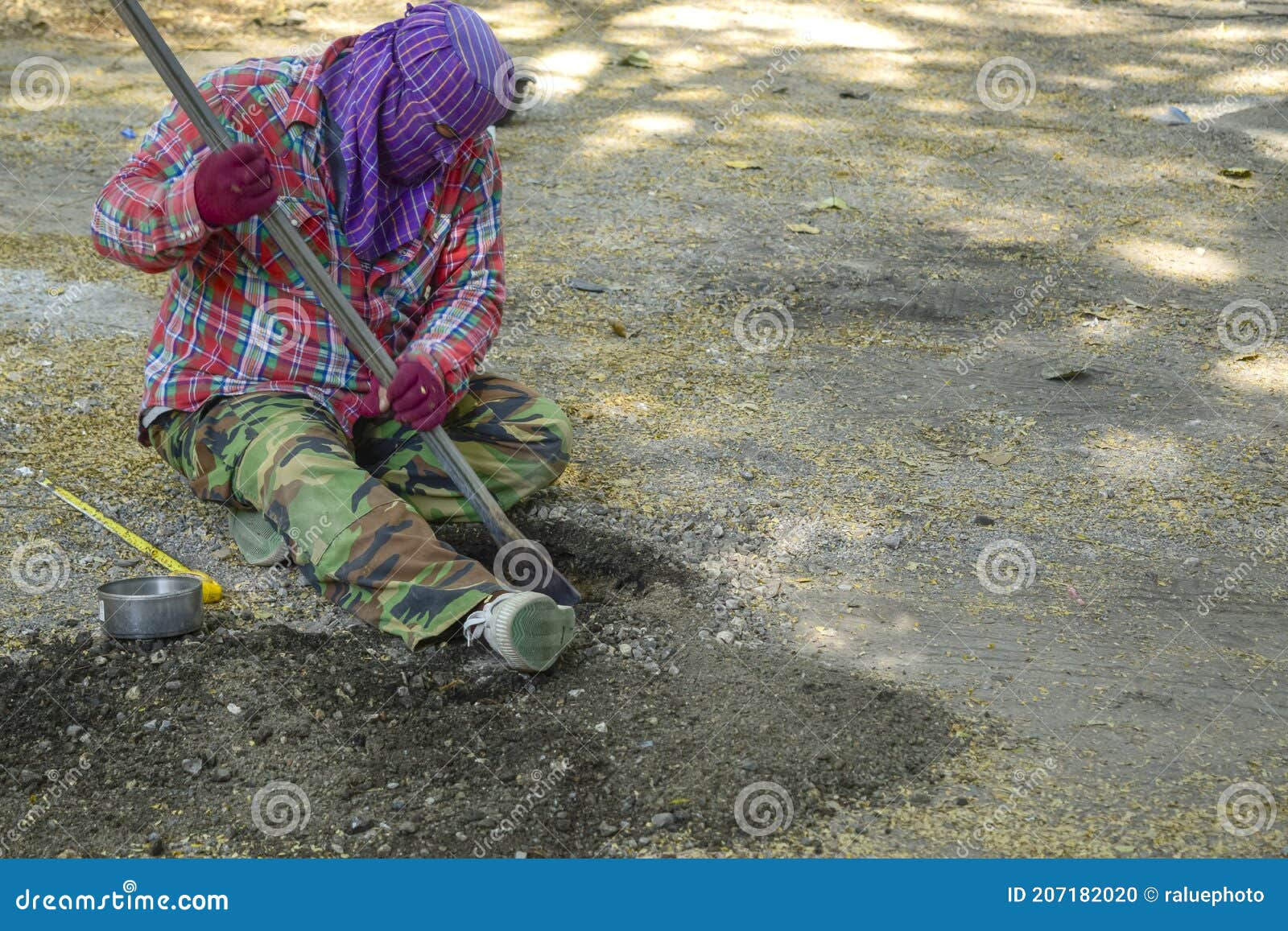 Workers are Using Equipment To Dig Holes in the Ground Stock Photo ...