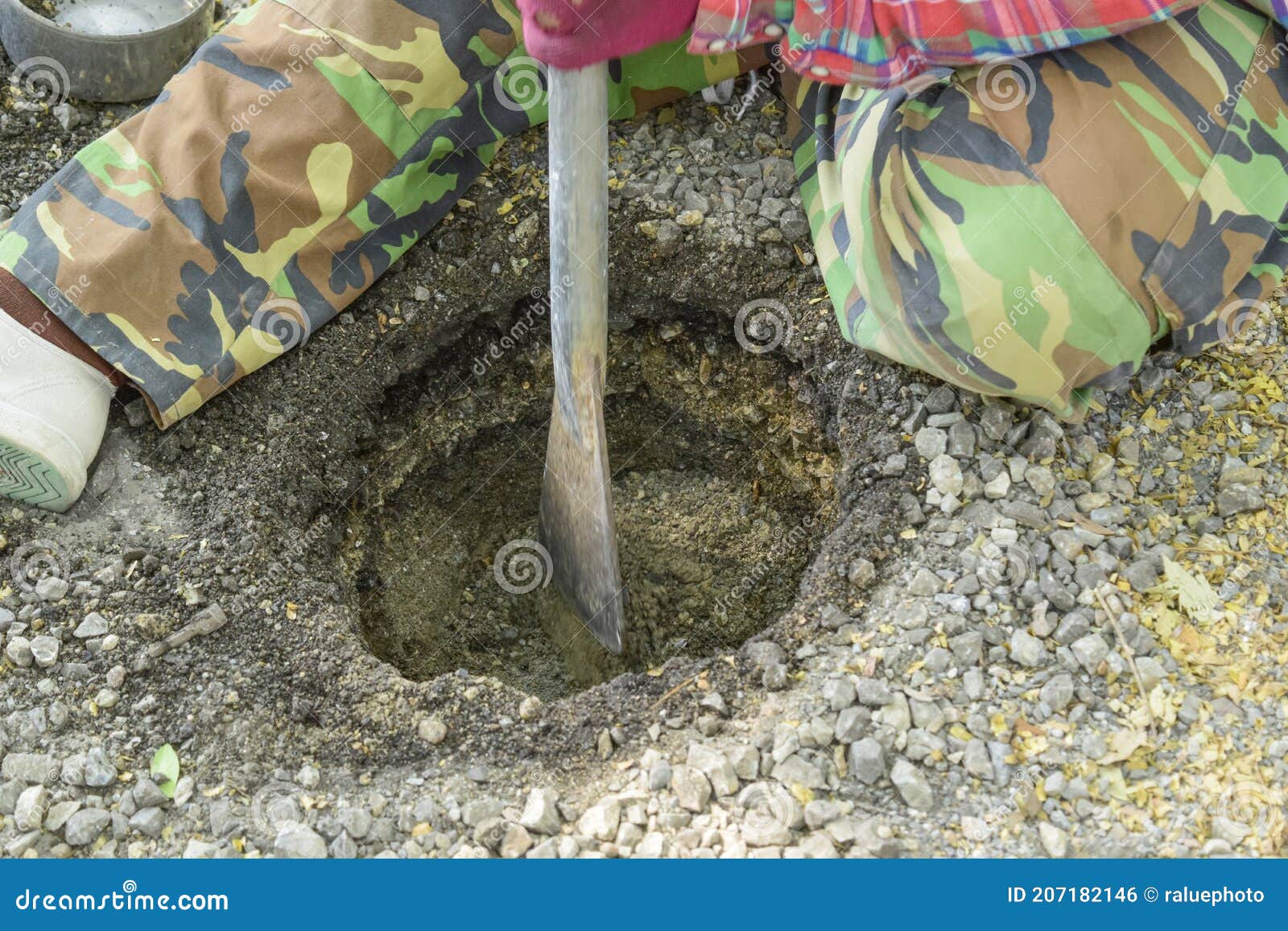 Workers are Using Equipment To Dig Holes in the Ground Stock Photo ...