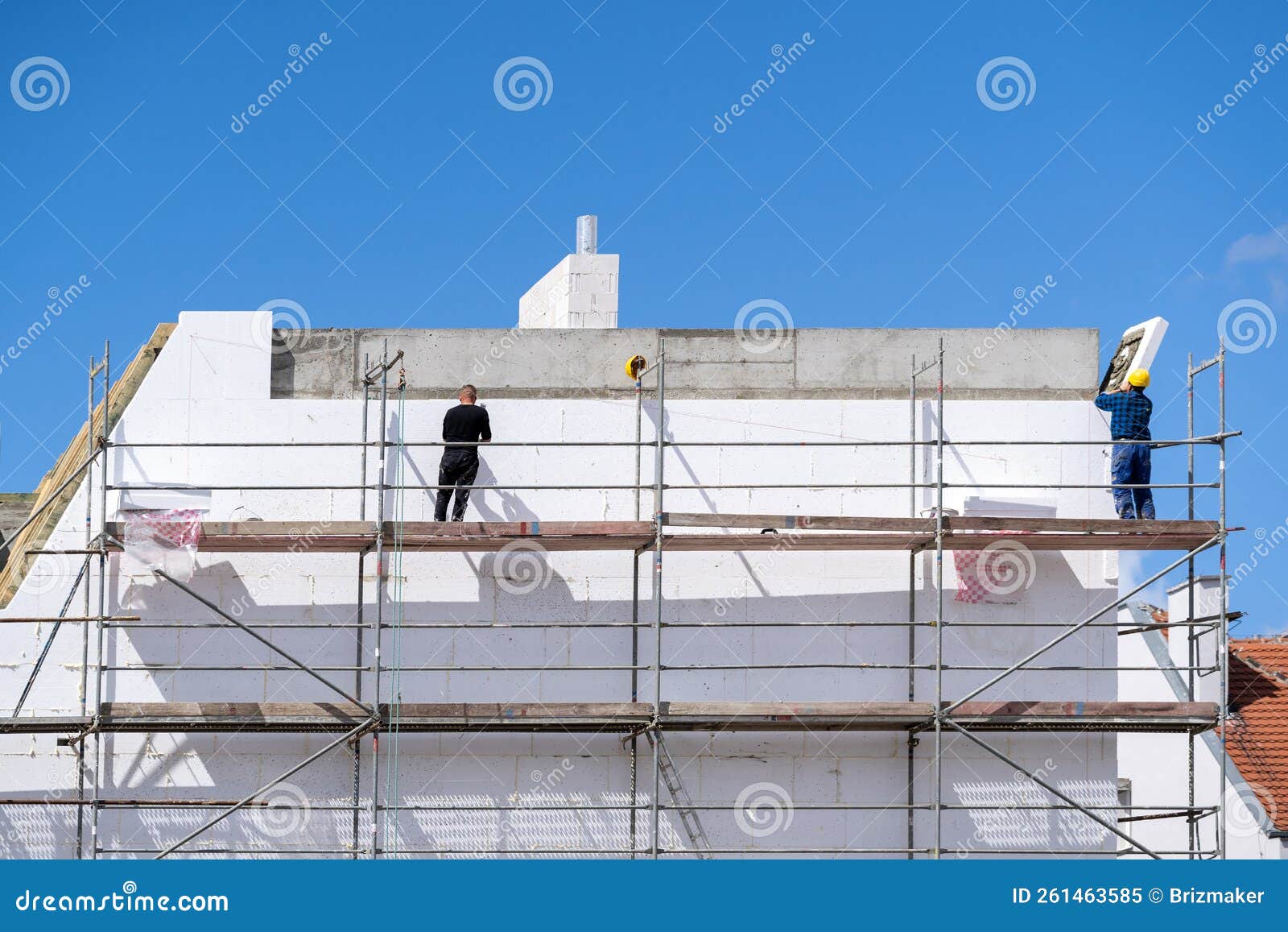 Workers Using Polystyrene and Install Styrofoam Material on Wall Stock ...