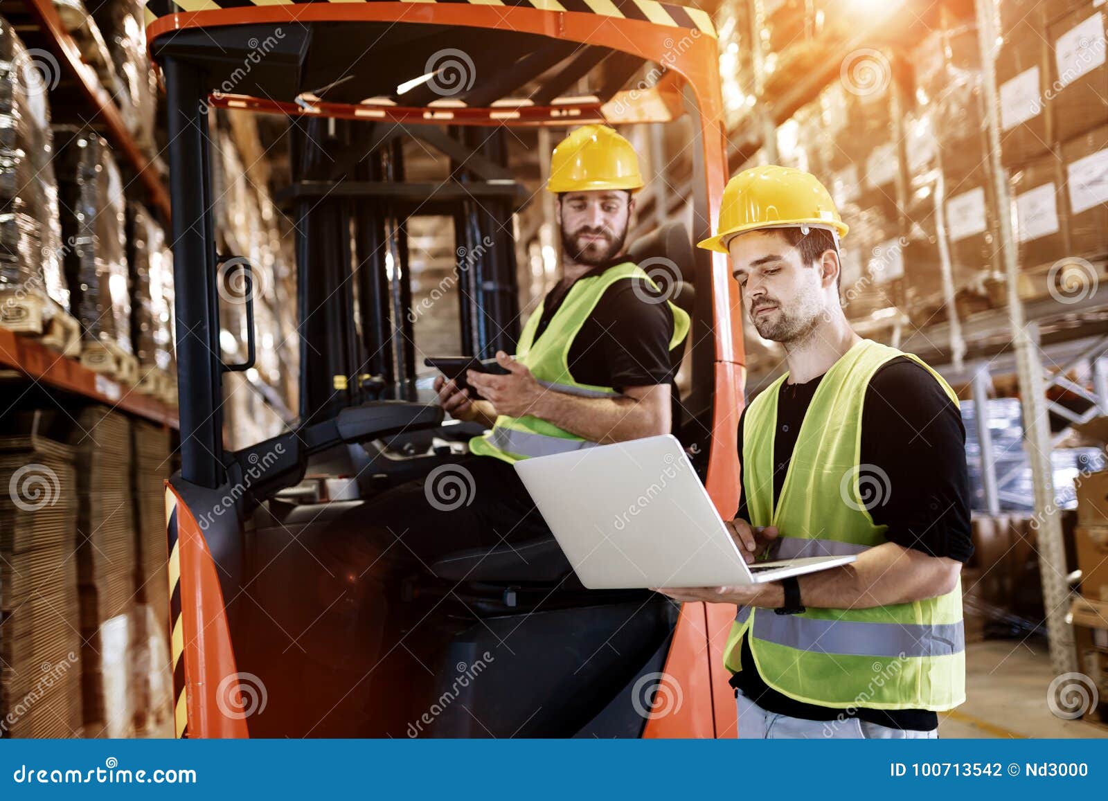 Workers Using Technology Forklift in Warehouse Stock Photo - Image of ...