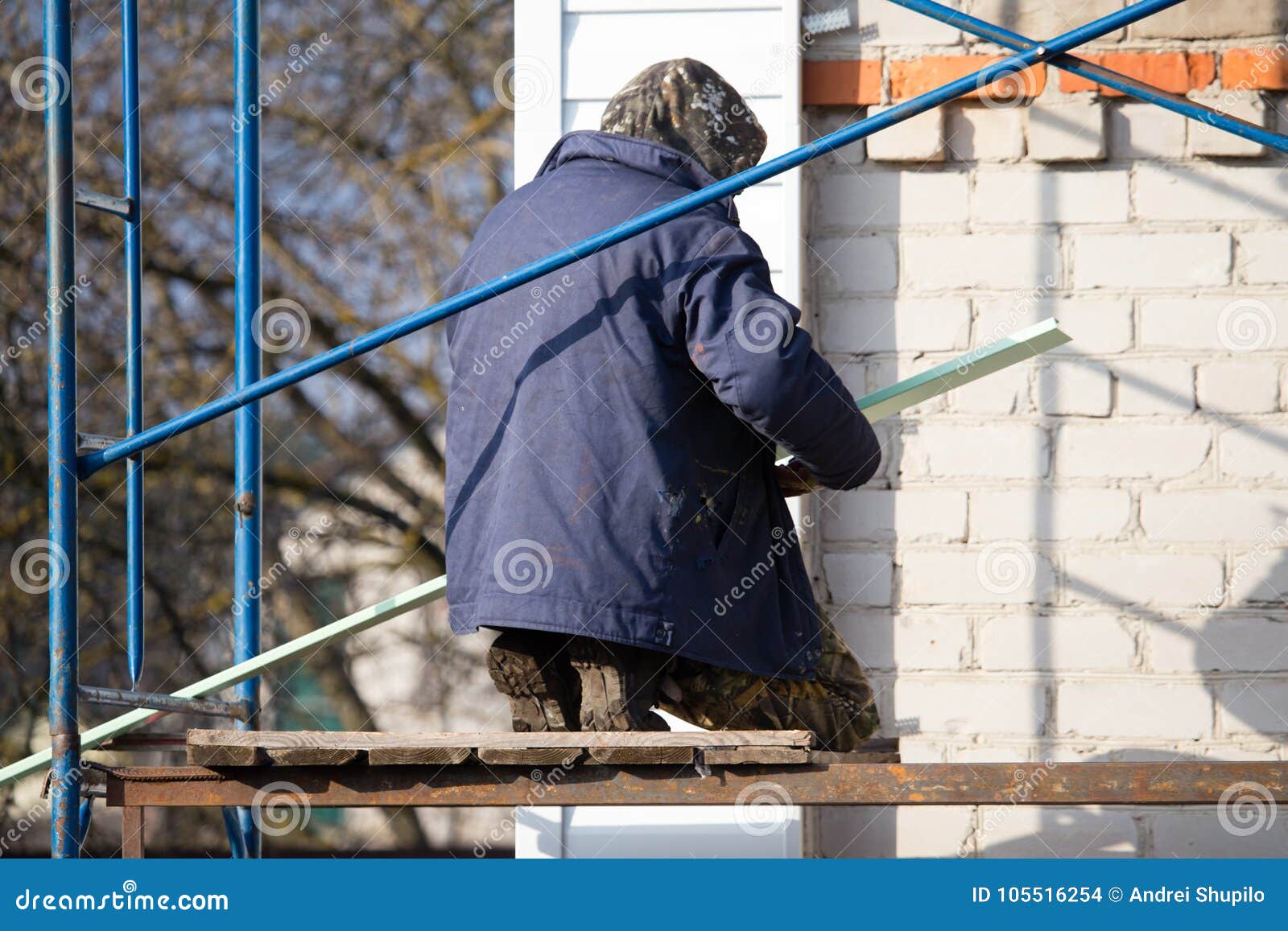 Workers Walling the House with Wall Siding Stock Photo - Image of ...